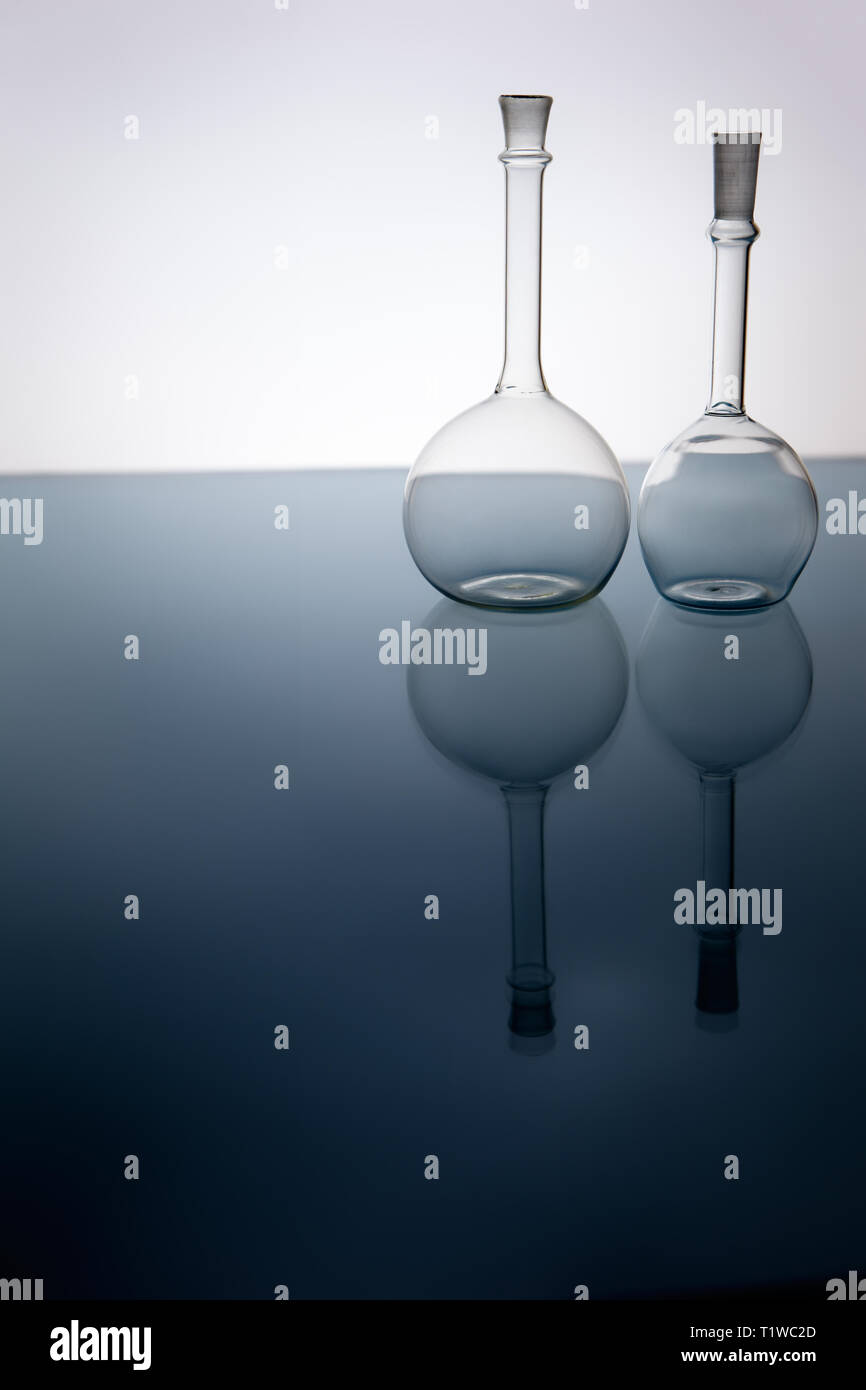 two beacons in the backlight, reflection, blue background Stock Photo ...