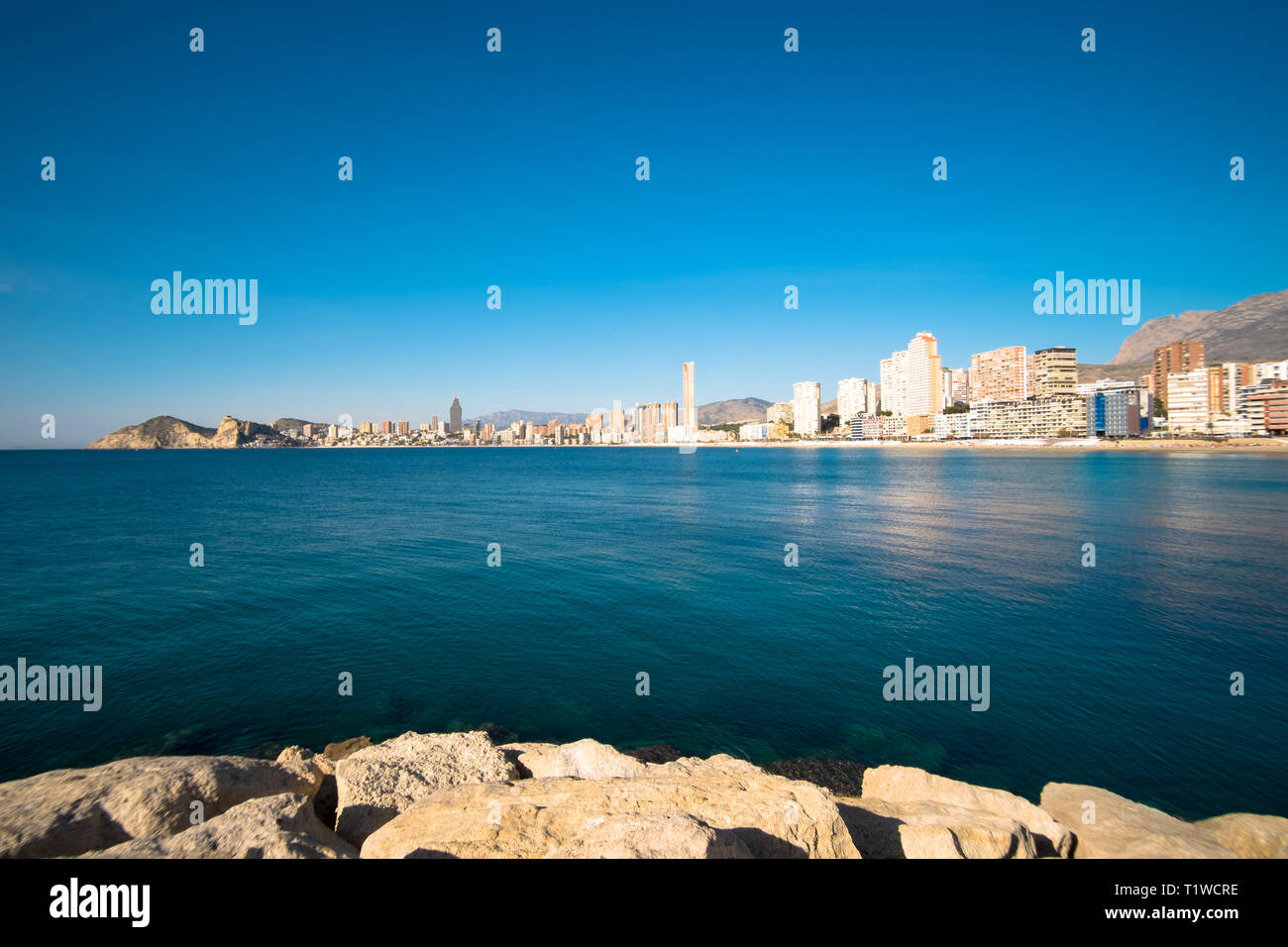 Sunny spring morning on Benidorm beach resort Stock Photo - Alamy