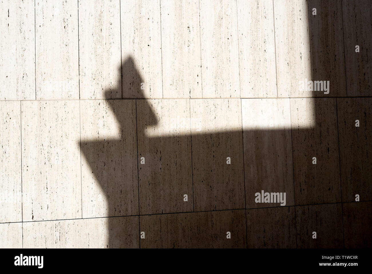 Shadow of a cross on top of a facade Stock Photo - Alamy
