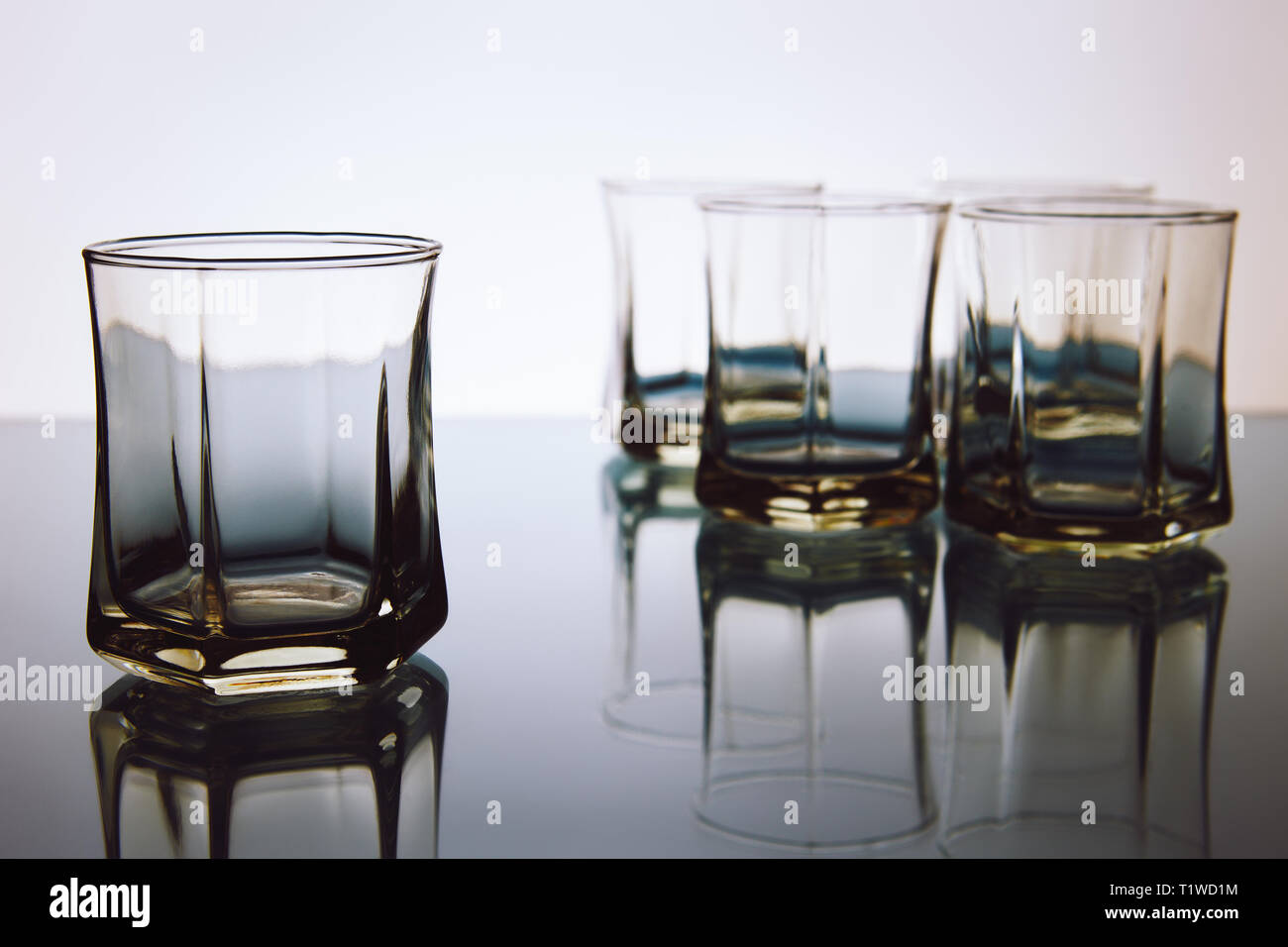 glass glasses in the backlight; with reflection Stock Photo - Alamy