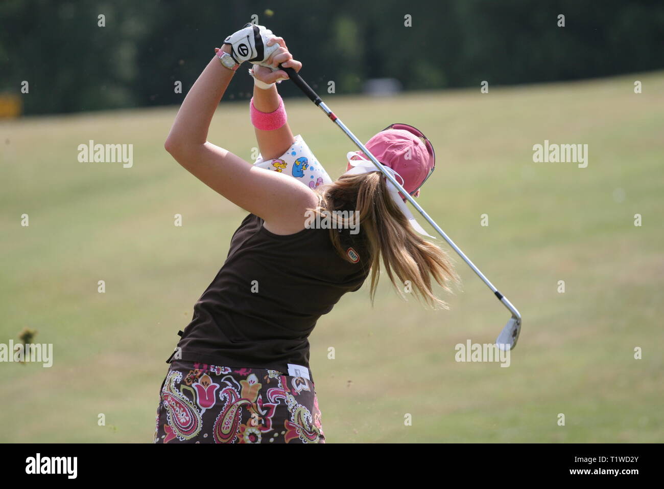 Lady golf swing Stock Photo - Alamy