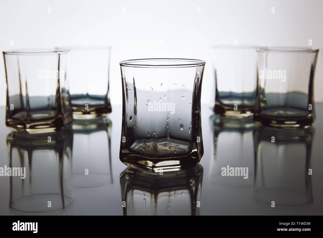 glass glasses in the backlight; with reflection Stock Photo - Alamy