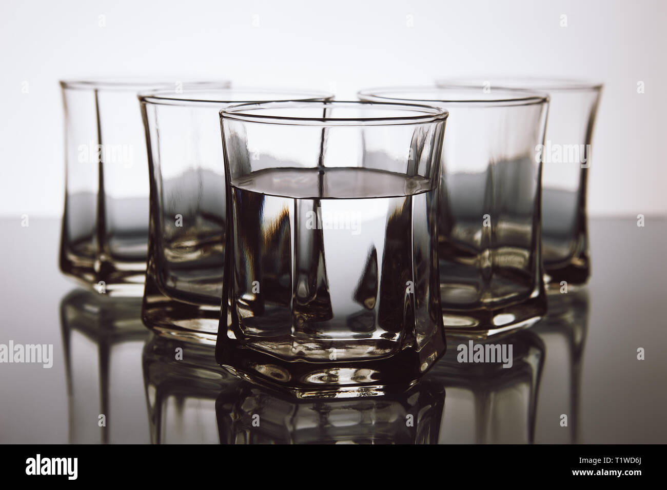 glass glasses in the backlight; with reflection Stock Photo - Alamy
