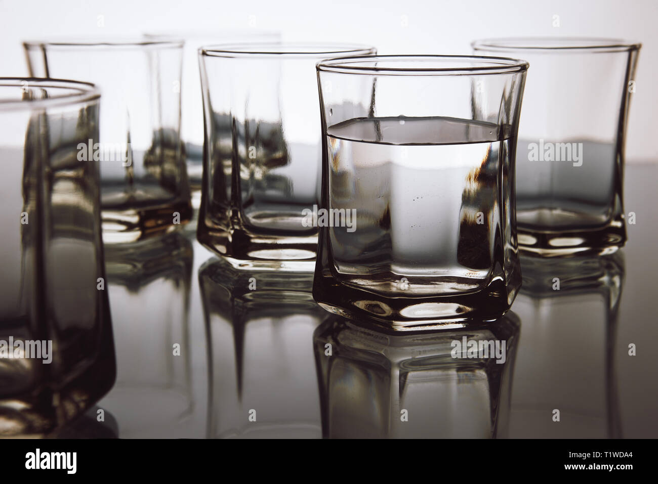 glass glasses in the backlight; with reflection Stock Photo - Alamy
