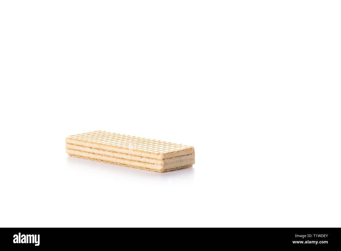 Multi-layered waffles with white creamy filling isolated on white ...