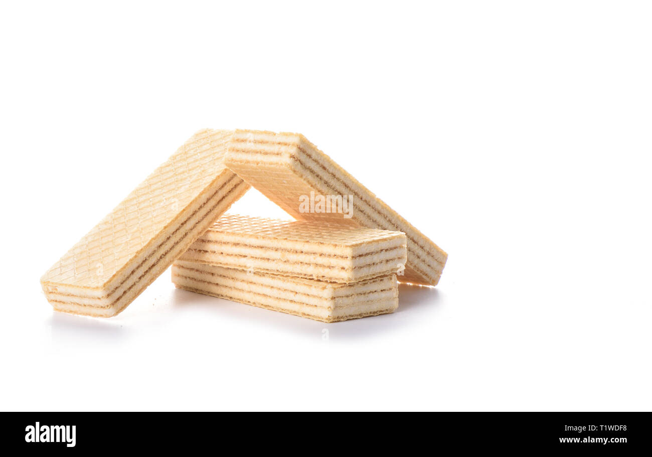 Multi-layered waffles with white creamy filling isolated on white ...