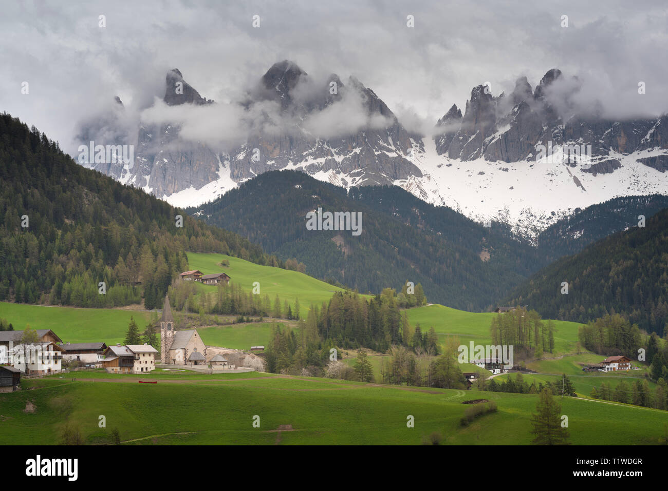 Colors of Dolomites. funes view of the valley, Puez-Odle in spring. at ...