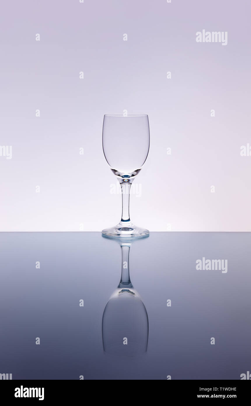 wine glass a reflection on a light background, backlighting Stock Photo ...