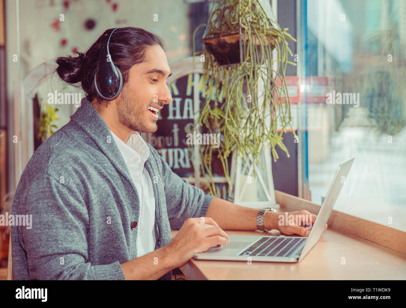 Indian man smiling side profile hi-res stock photography and images - Alamy