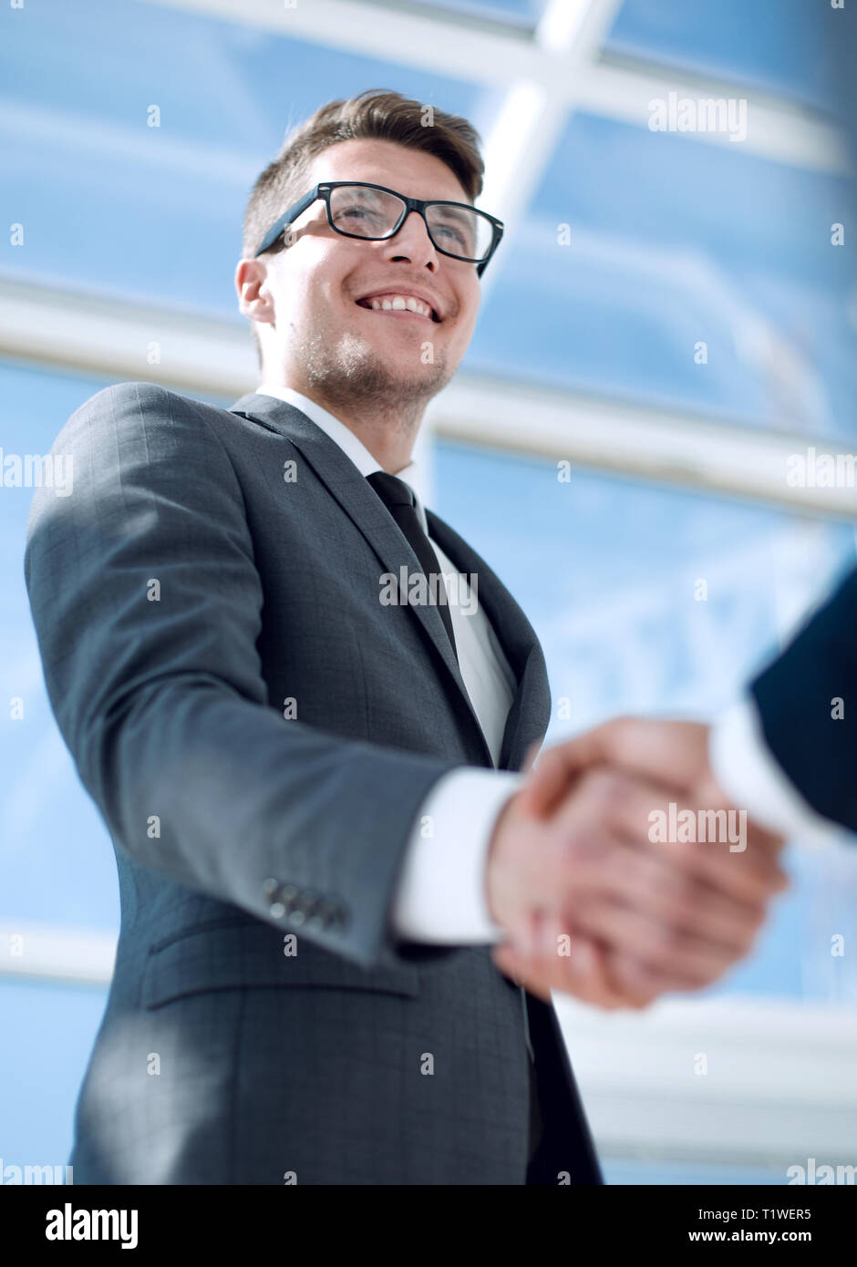 handshake of business partners .bottom view Stock Photo - Alamy