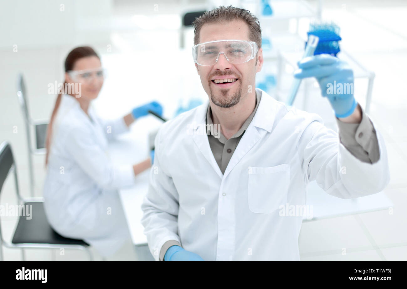 Successful scientist checking results hi-res stock photography and ...