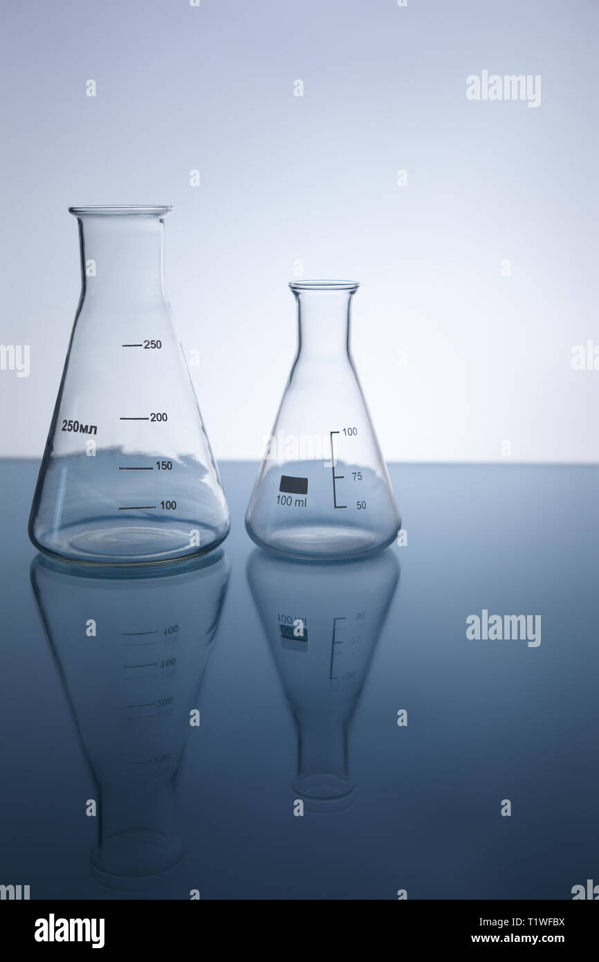 two beacons in the backlight, reflection, blue background Stock Photo ...