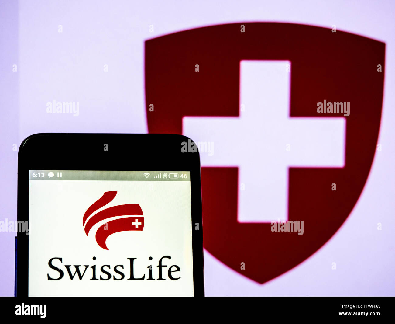 In this photo illustration a Swiss Life Group logo seen displayed on a ...