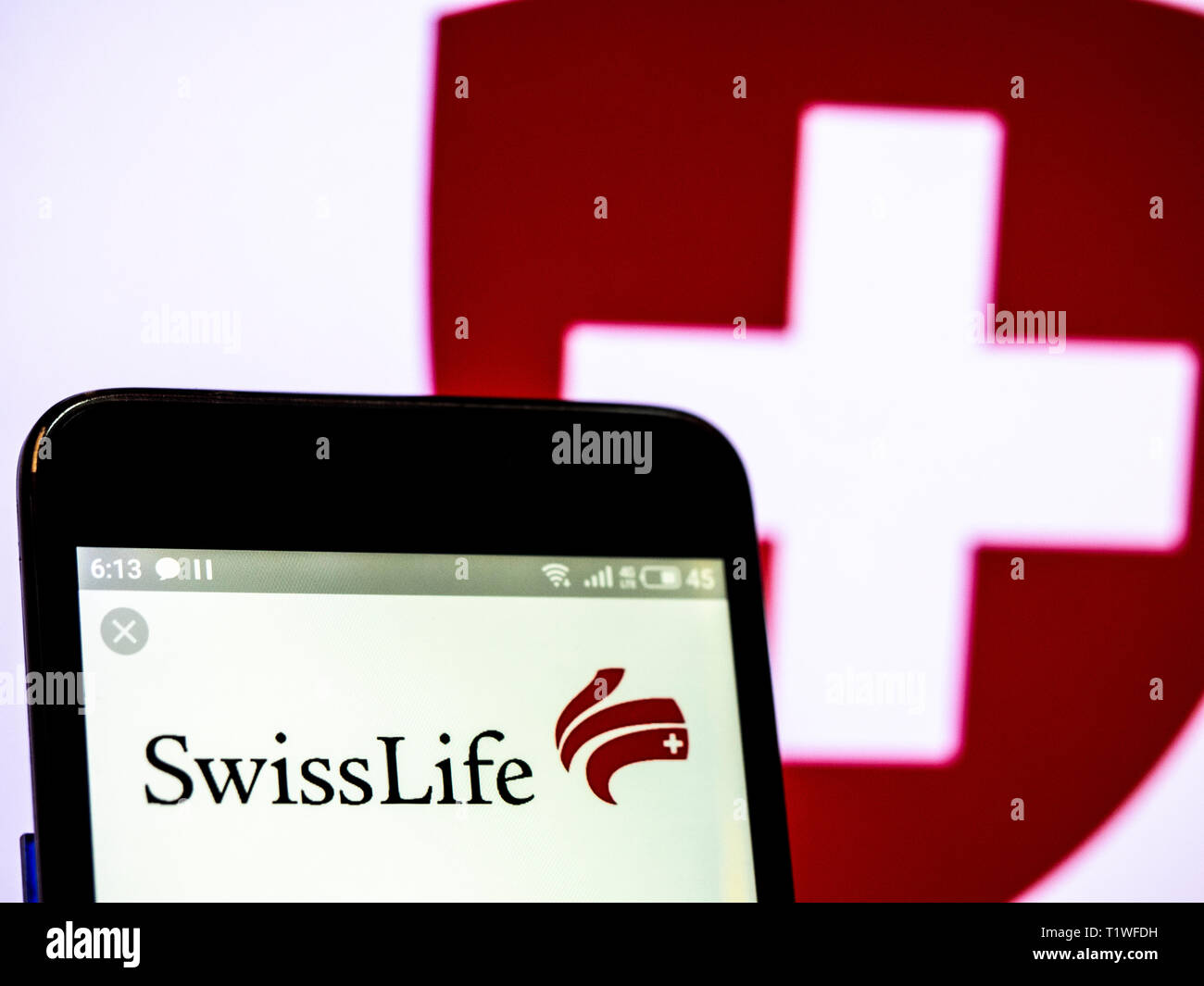 In this photo illustration a Swiss Life Group logo seen displayed on a ...
