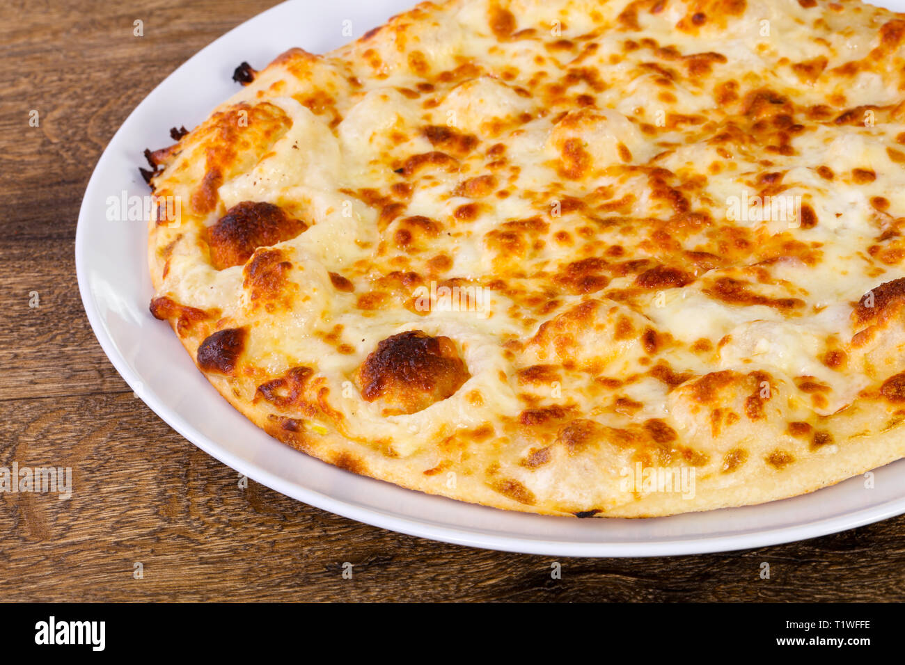 Hot Tasty Cheese pizza Stock Photo - Alamy
