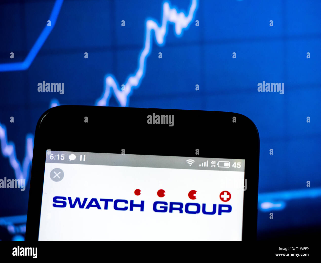In this photo illustration The Swatch Group AG logo seen displayed on a ...
