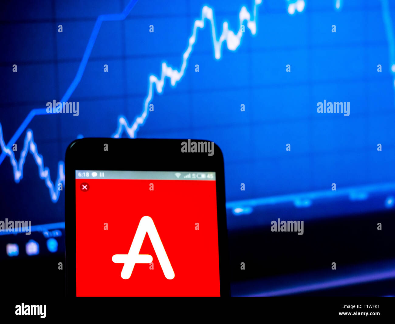In this photo illustration The Adecco Group logo seen displayed on a ...