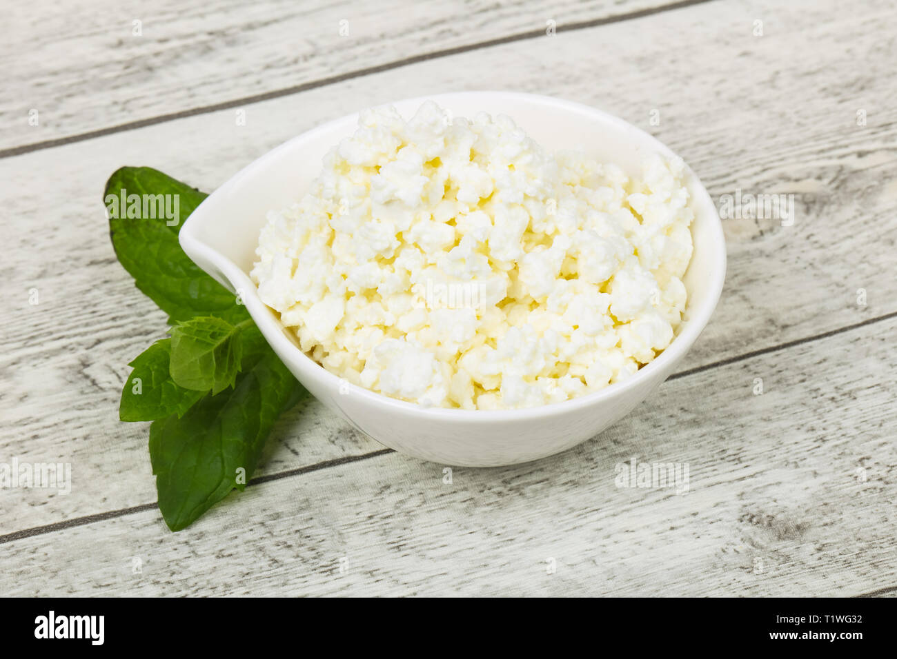 Natural cottage cheese served mint leaves Stock Photo - Alamy