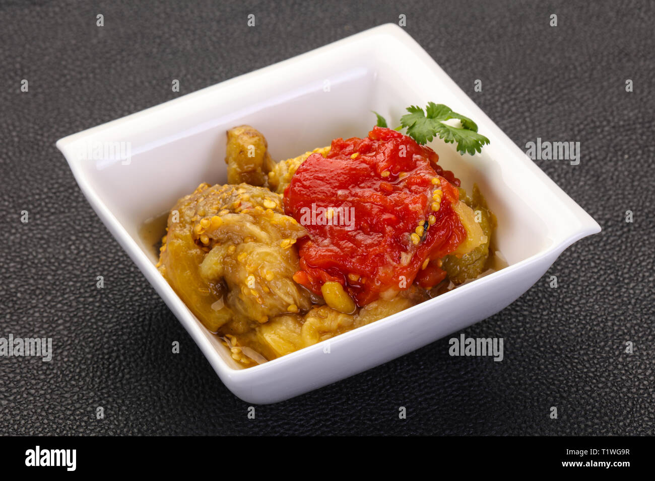 Caucasian cuisine - baked vegetables eggplant and tomato Stock Photo ...
