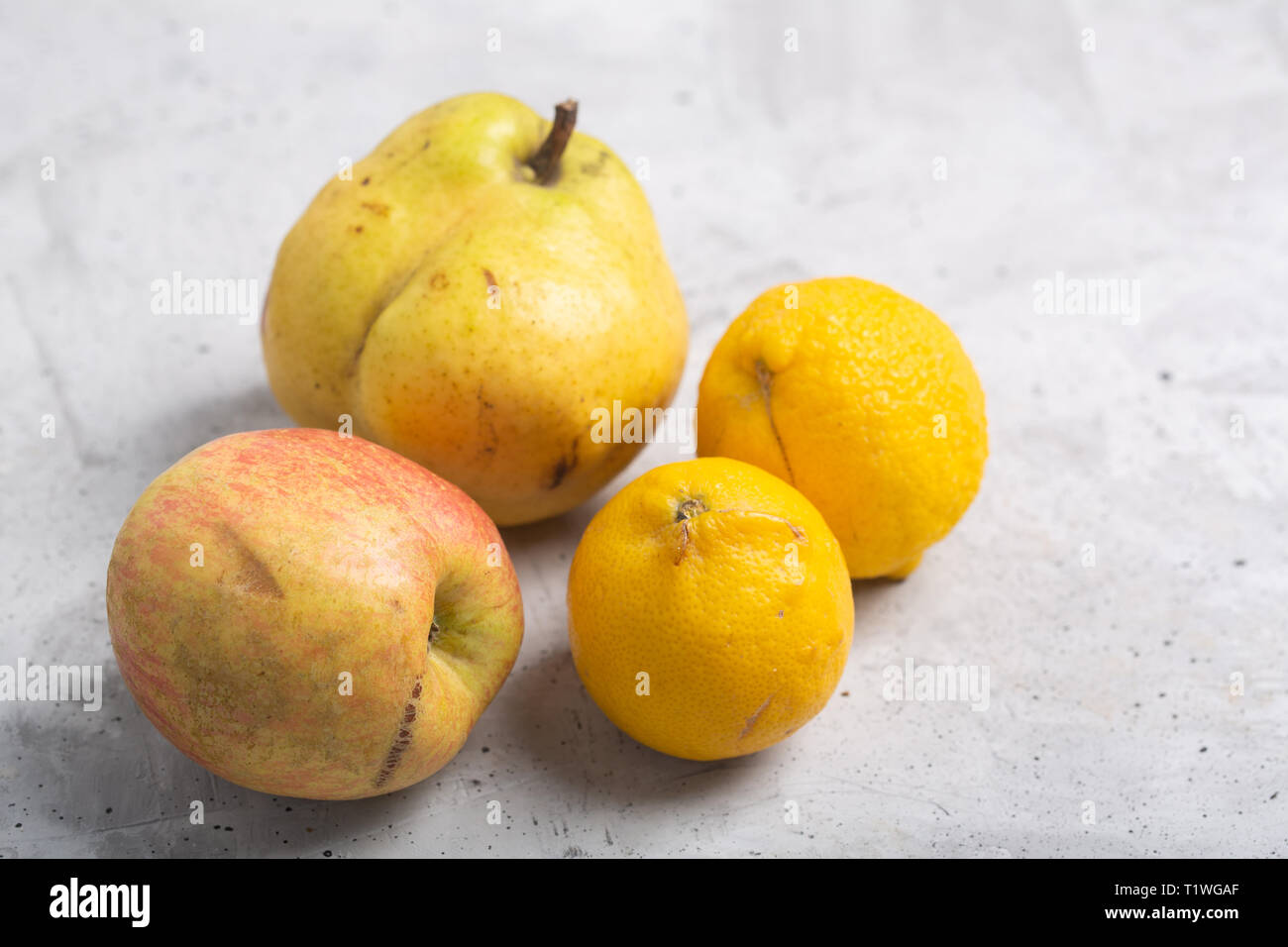 Trendy ugly organic fruits on the table. Horizontal orientation Stock ...