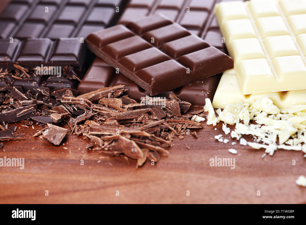 chocolate in diffrent color. milk, dark and white chocolate bars and ...