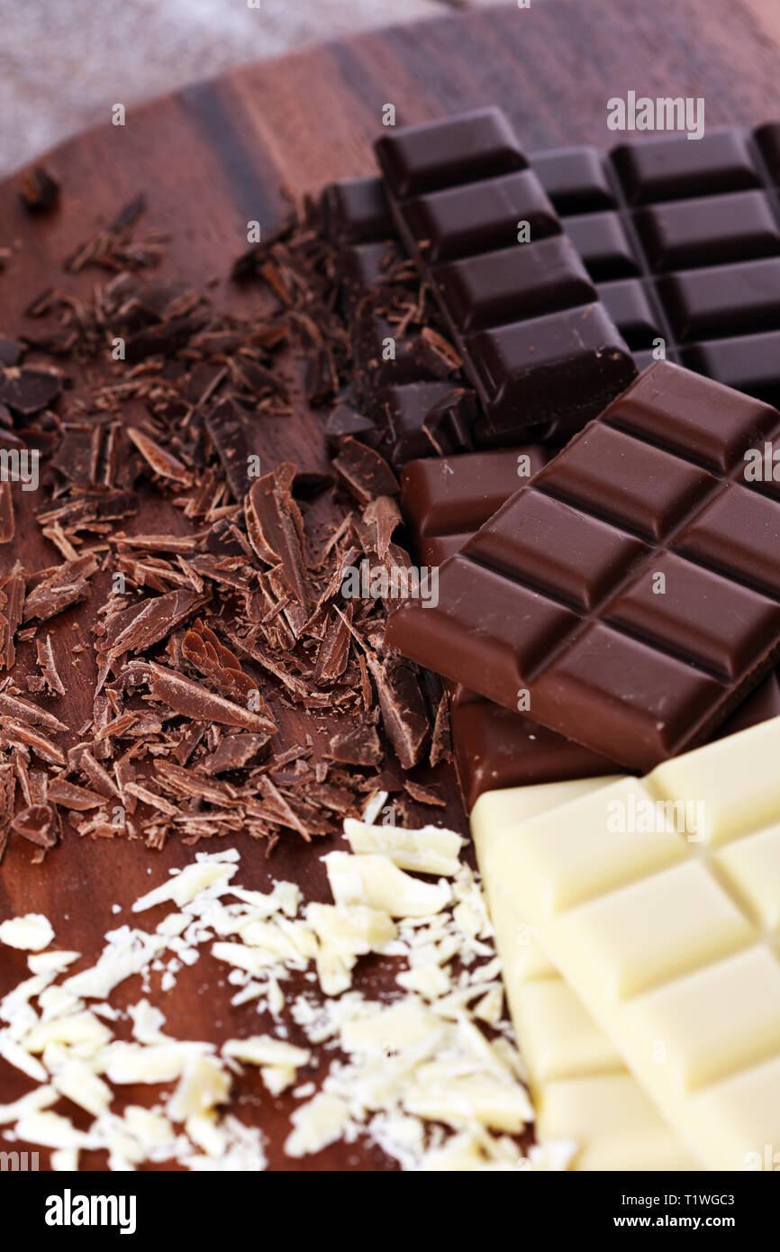 chocolate in diffrent color. milk, dark and white chocolate bars and ...