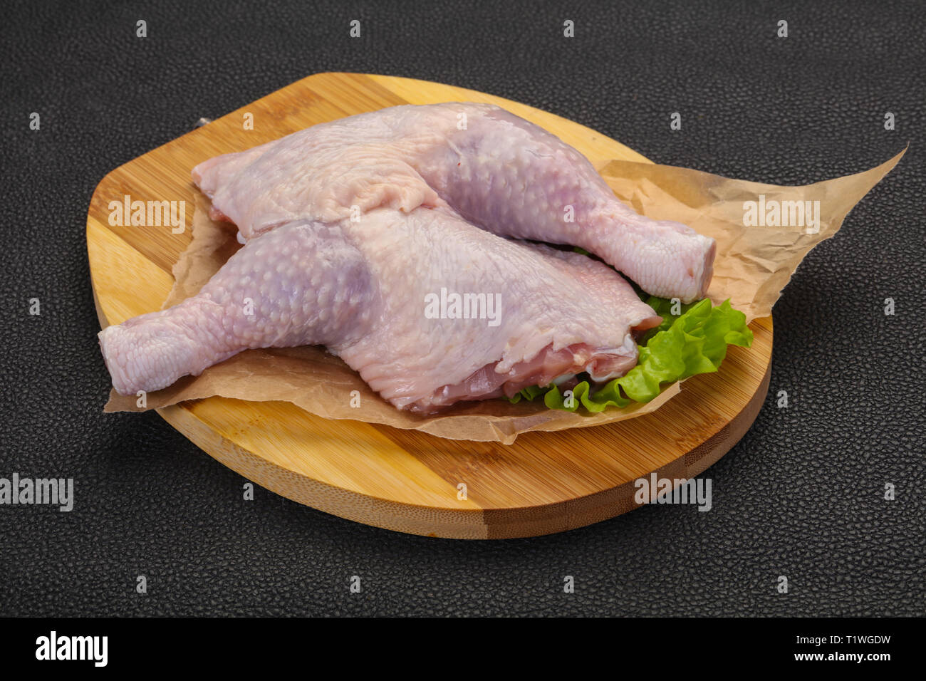 Raw chicken leg ready for cooking Stock Photo - Alamy