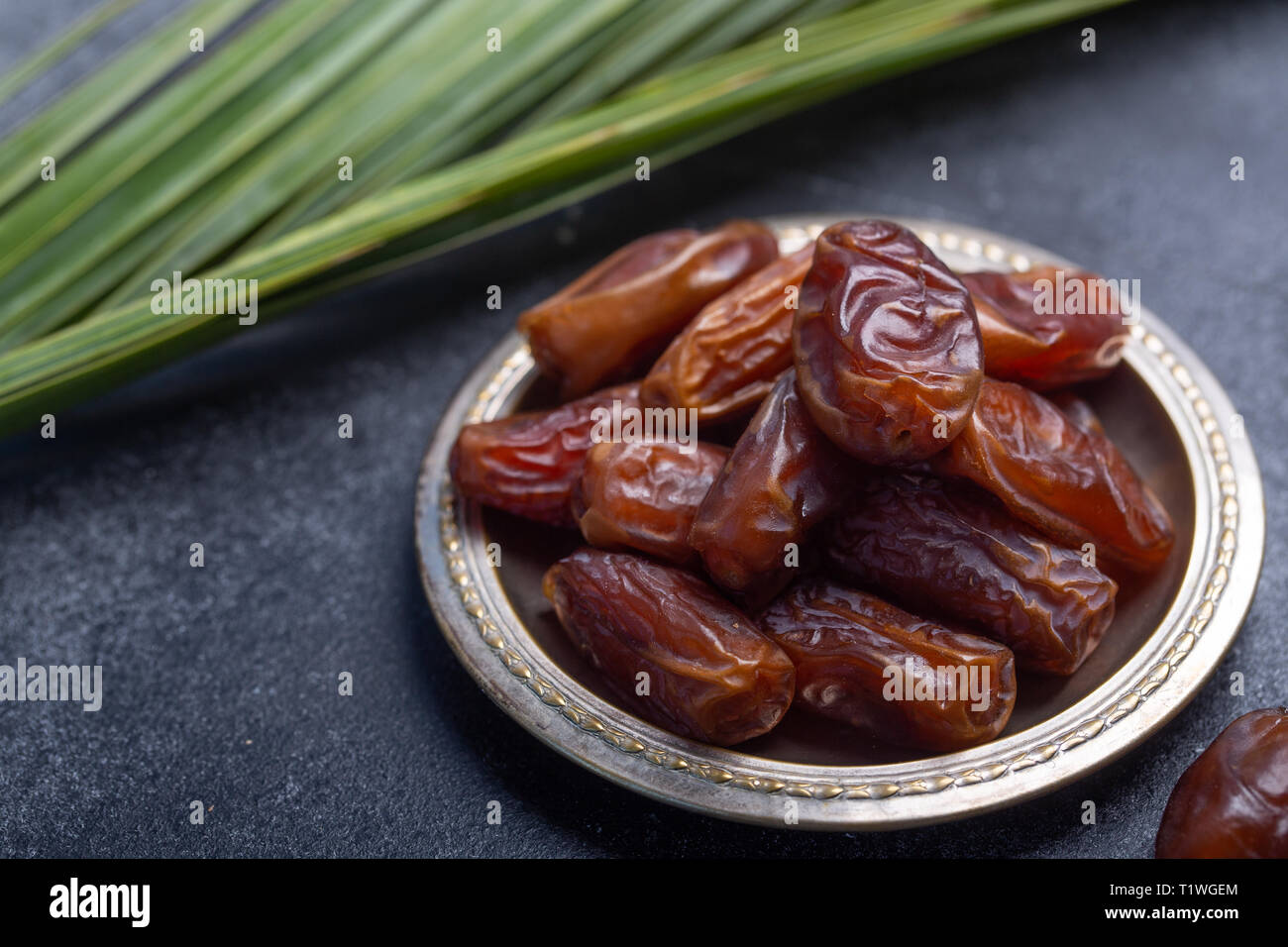 Ramadan dates is traditional food for iftar in islamic world. Dark ...