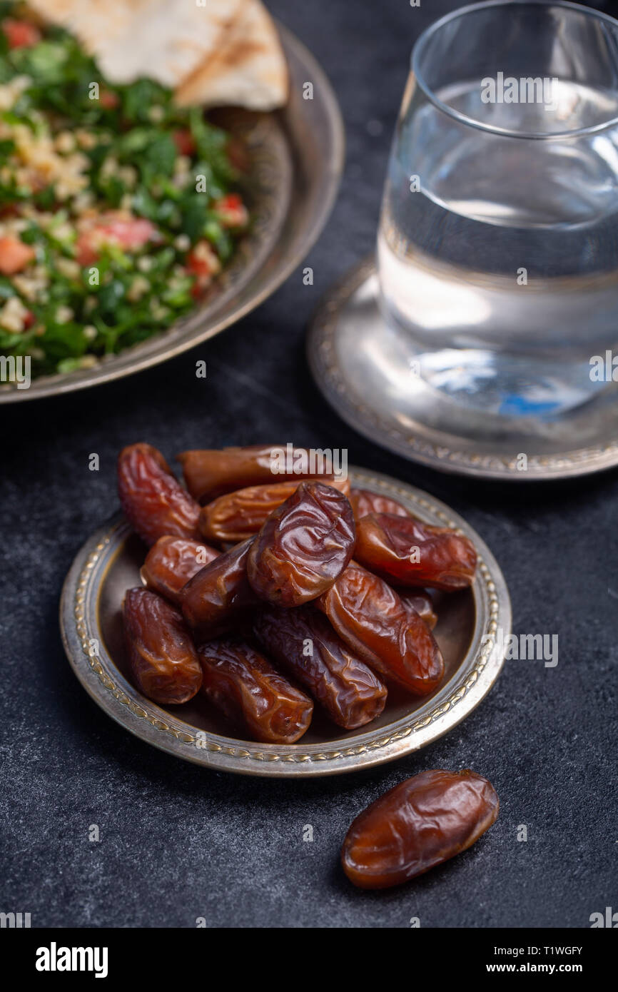 Ramadan dates is traditional food for iftar in islamic world. Dark ...