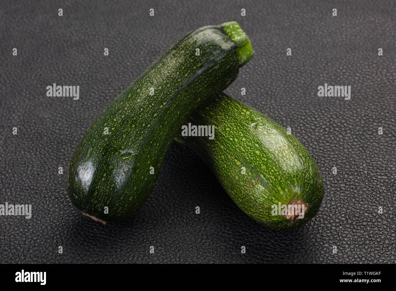Raw ripe zucchini ready for cooking Stock Photo - Alamy