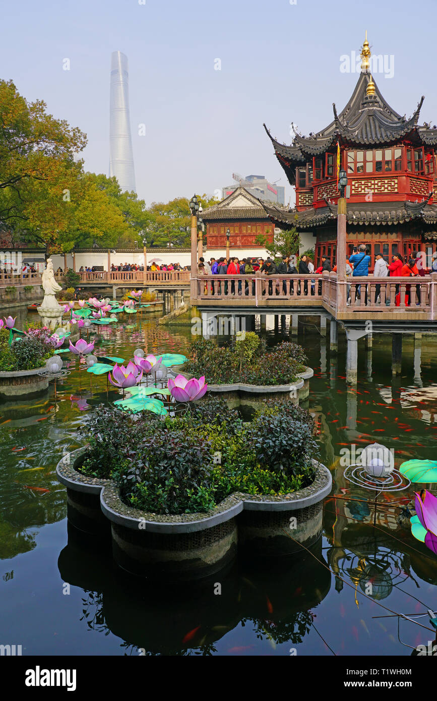 SHANGHAI, CHINA -4 MAR 2019- View of the Jiuqu Bridge and koi pond at ...