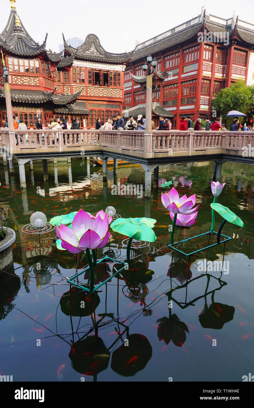 SHANGHAI, CHINA -4 MAR 2019- View of the Jiuqu Bridge and koi pond at ...