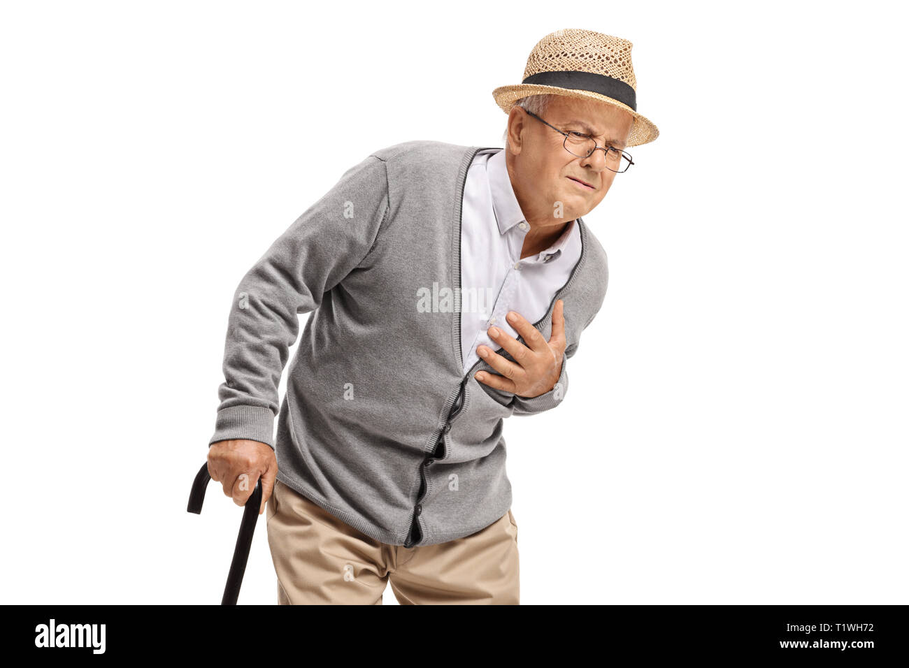 Elderly man having a heart attack isolated on white background Stock ...