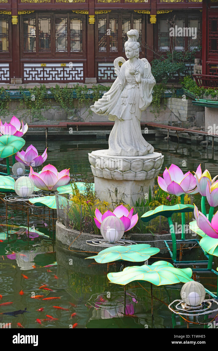 SHANGHAI, CHINA -4 MAR 2019- View of the Jiuqu Bridge and koi pond at ...