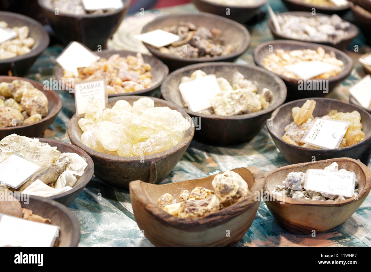 Oriental asian woman, with typical kimono, writes names in Japanese ...