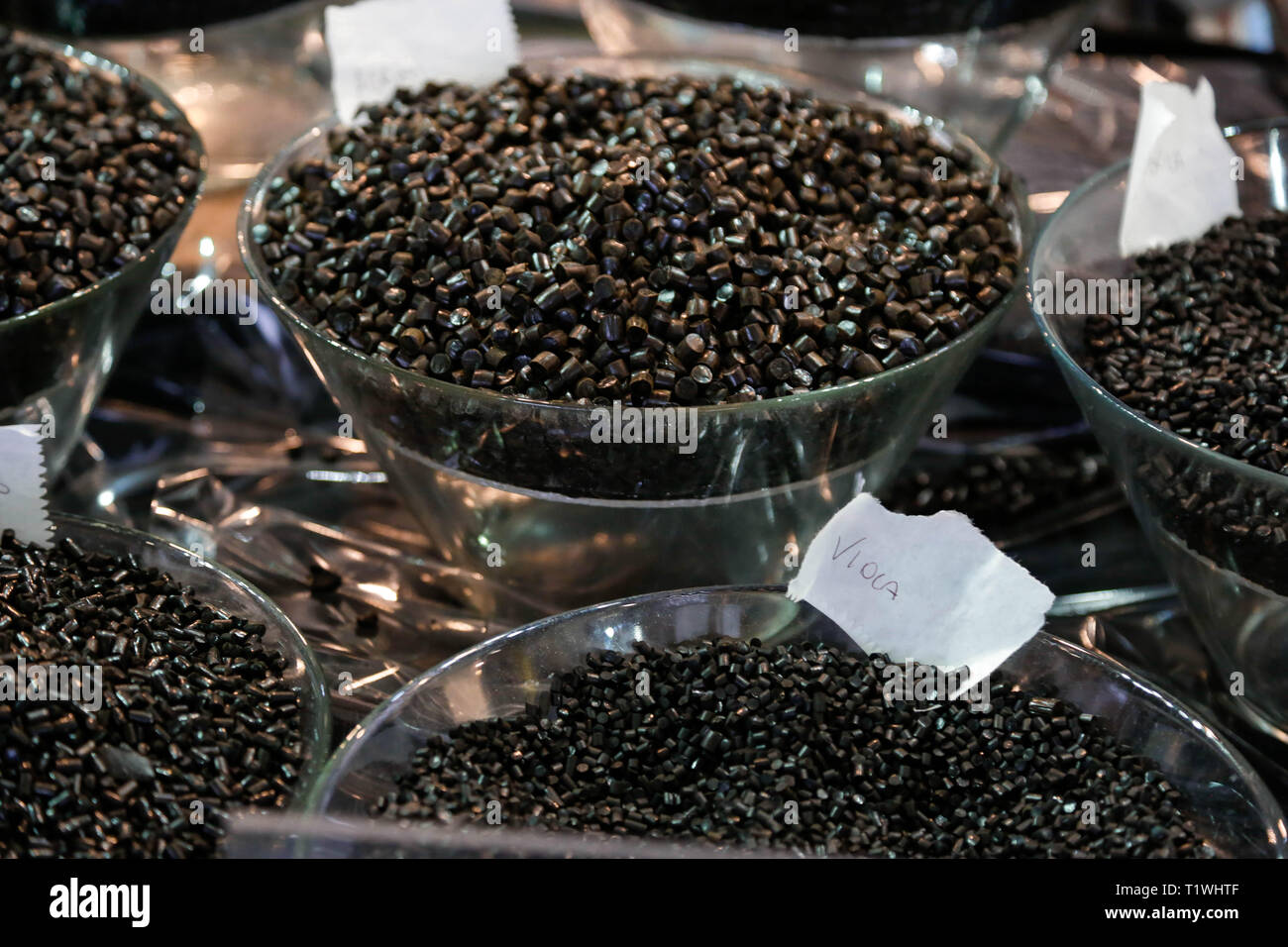 Oriental asian woman, with typical kimono, writes names in Japanese ...
