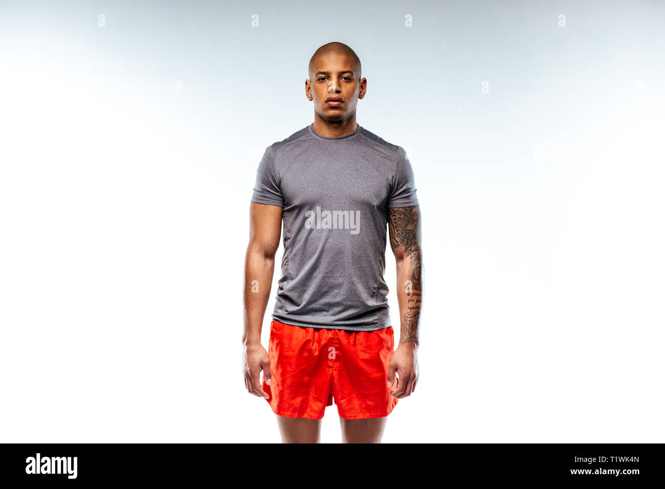 Young muscular man wearing red hi-res stock photography and images - Alamy