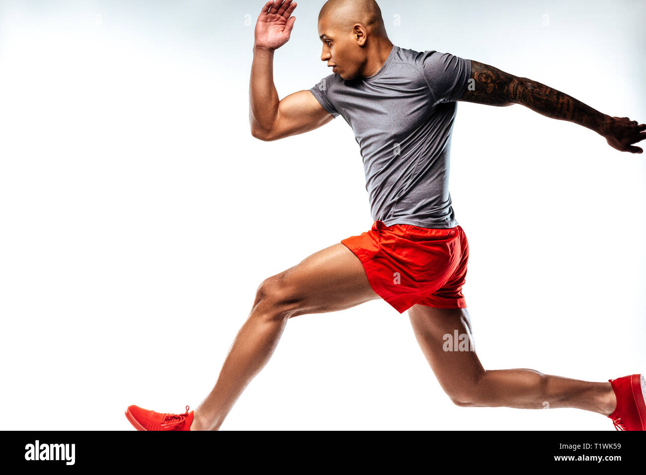 Athletics sportsman demonstrating his amazing running skills Stock ...