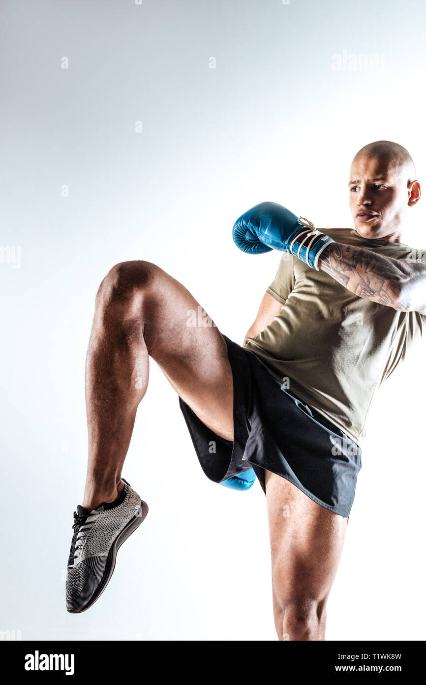 Man keeping the balance in fighting position Stock Photo - Alamy