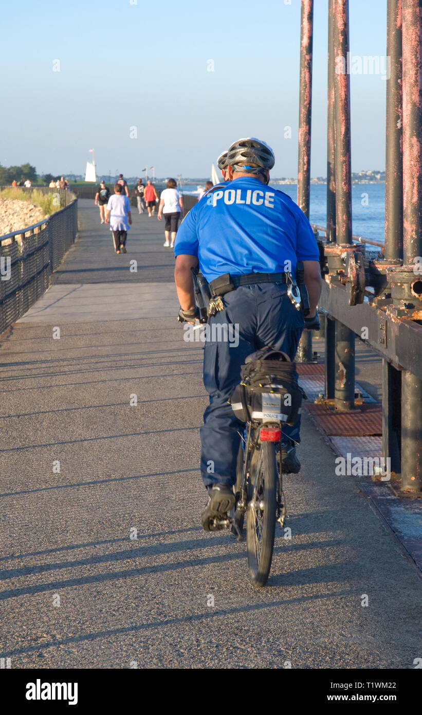 Police officer on bicycle in South Boston Stock Photo - Alamy