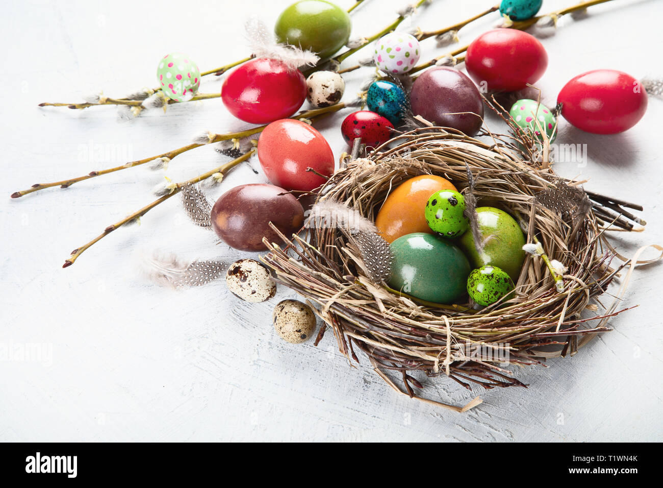 Easter eggs in bird nest. Happy Easter Stock Photo - Alamy