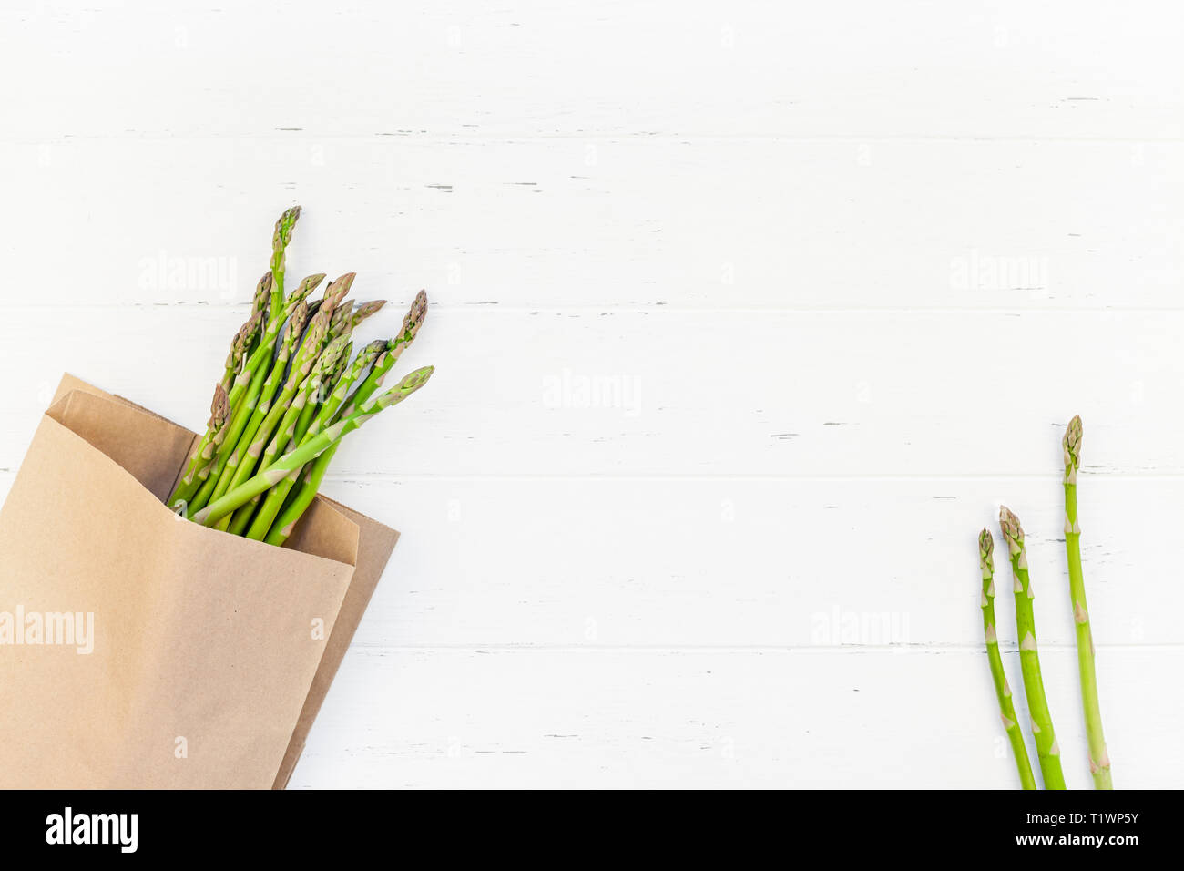 Creative scandinavian style flat lay top view mockup of fresh green ...