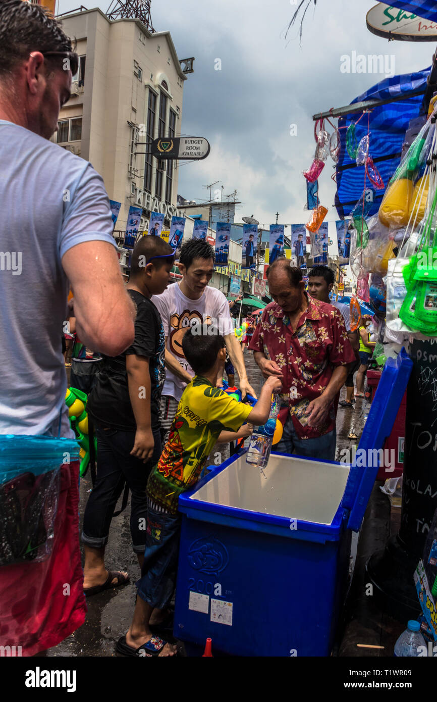 A seller at Thai new year of Songkran in Khaosan Road, Bangkok Thailand ...