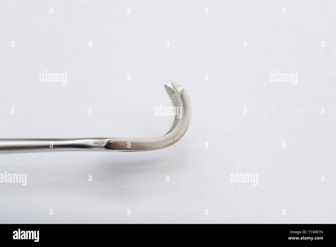 two teeth retractor Stock Photo - Alamy