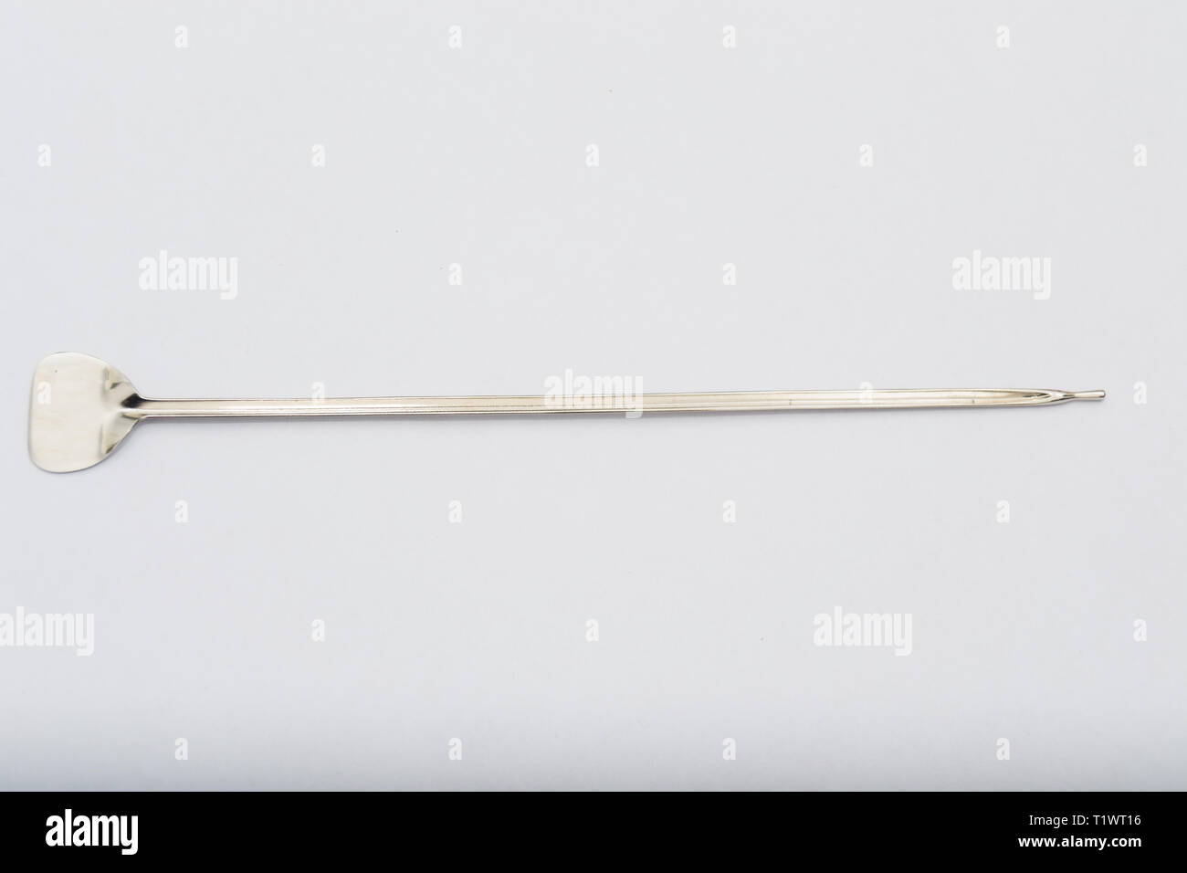Buttoned probe for fistula on white background Stock Photo - Alamy