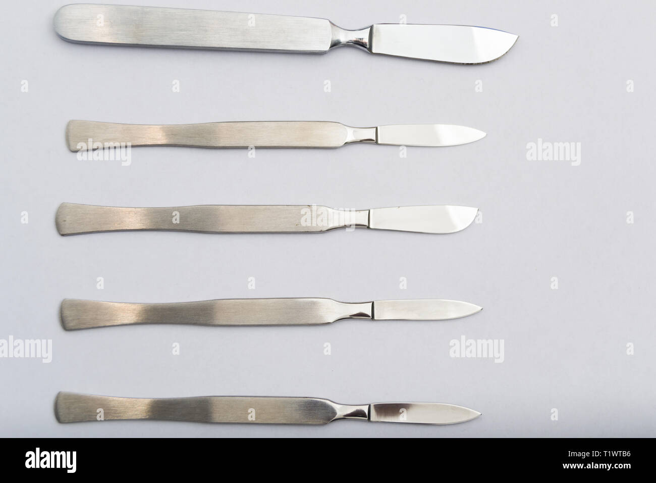 One-Piece Scalpels on white background Stock Photo - Alamy