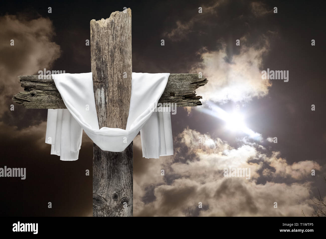 Easter wooden cross on dramatic sky. He is risen concept Stock Photo ...