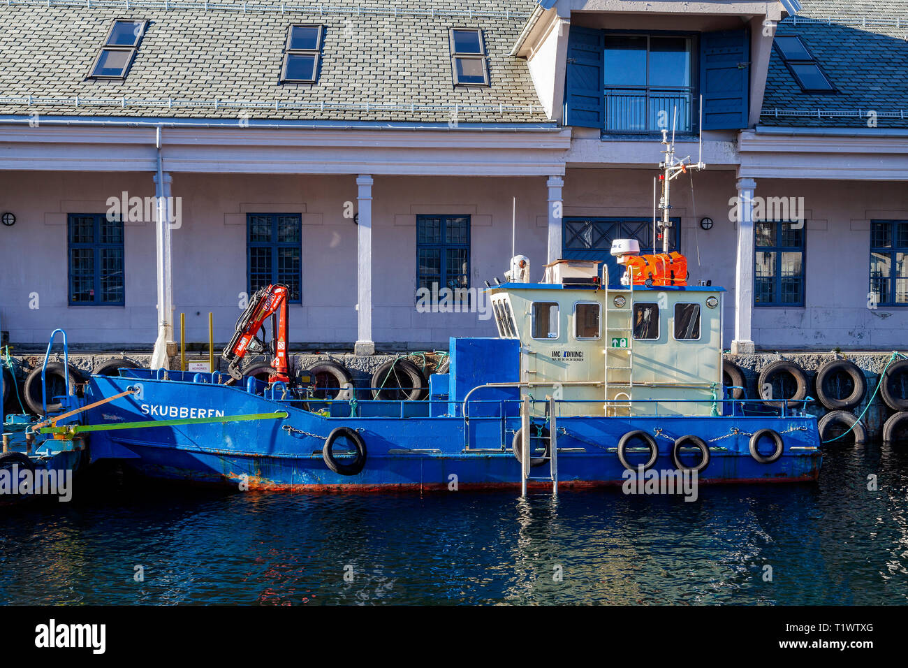 Service vessel and barge pusher Skubberen moored at Tollbodkaien quay ...