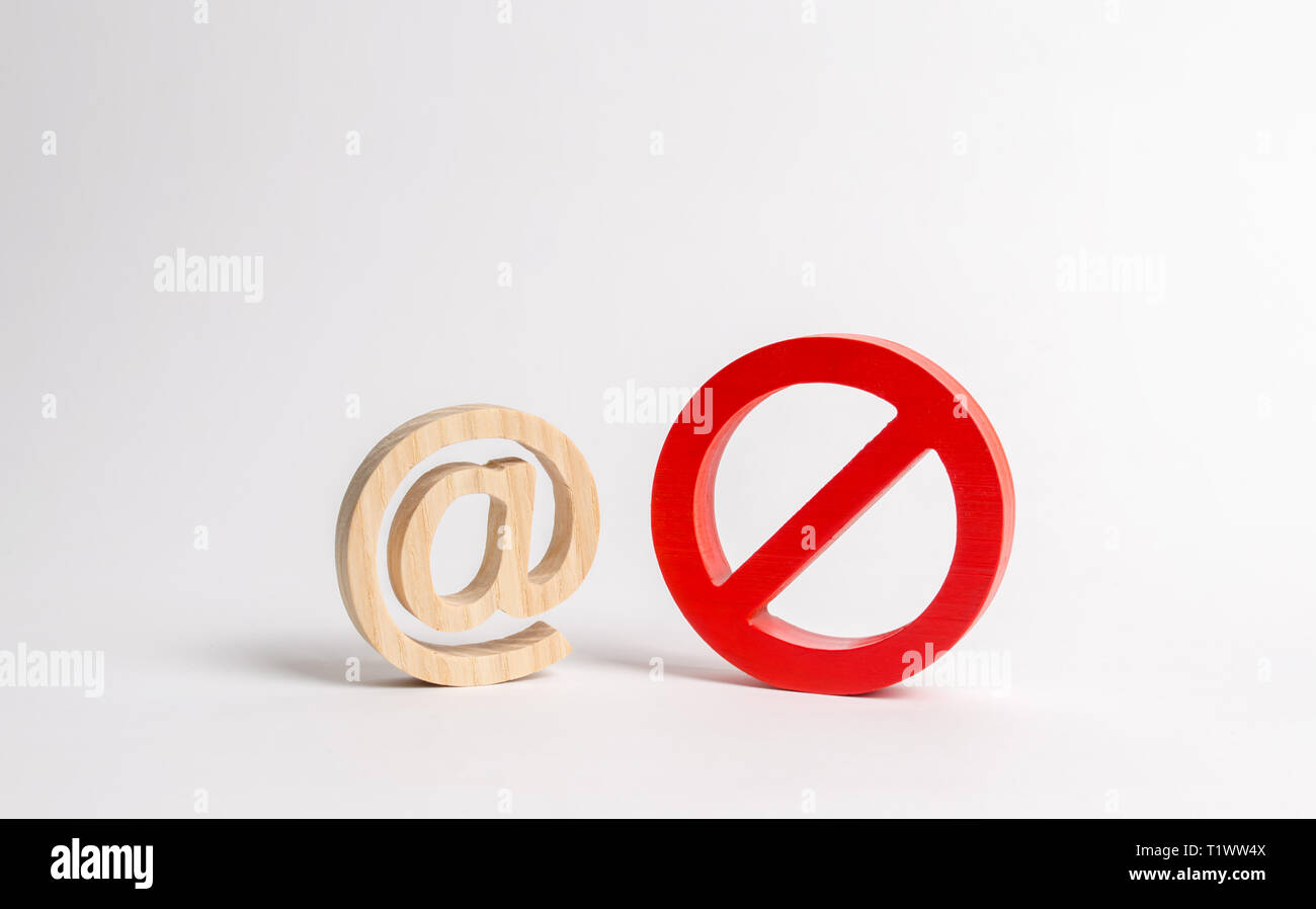 Figure of e-mail or internet and a symbol of prohibition or restriction ...
