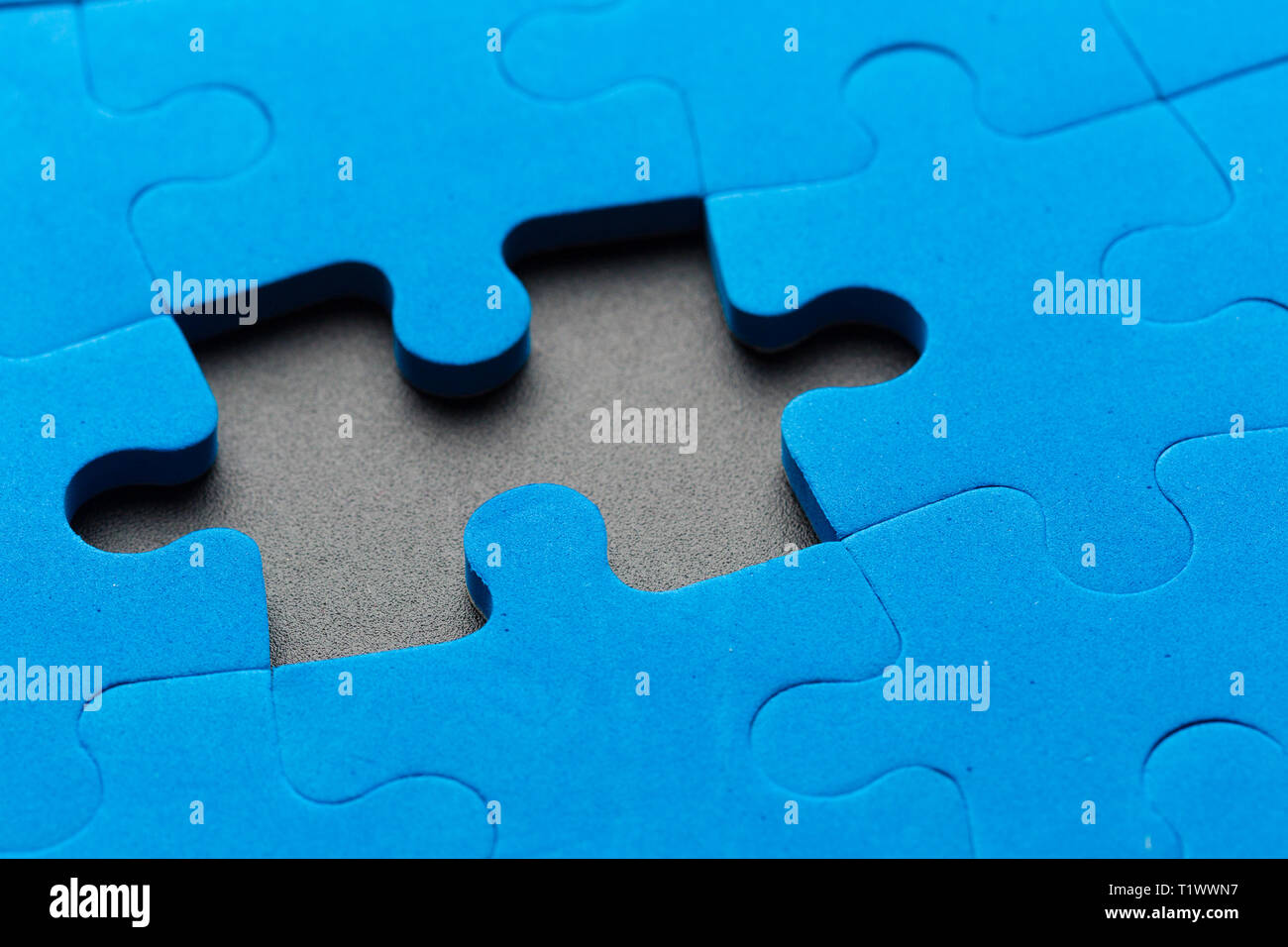 Missing puzzle piece Stock Photo - Alamy